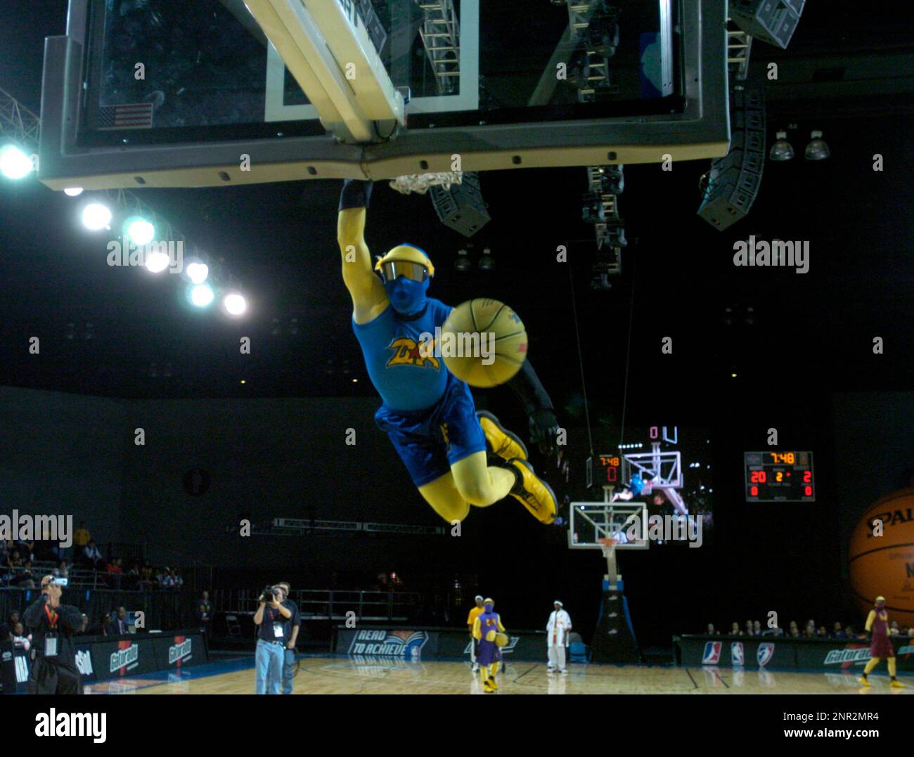 The "High Impact" Slam Dunk squad performs at center court of the NBA ...
