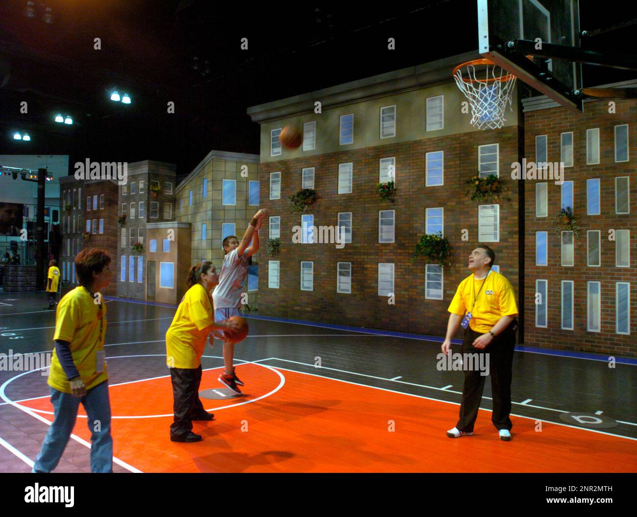 Fans shoot baskets at the NBA All-Star Jam Session at the Los Angeles ...