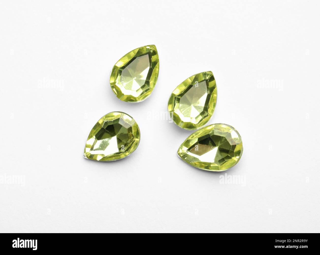 Beautiful gemstones on white background, top view Stock Photo - Alamy