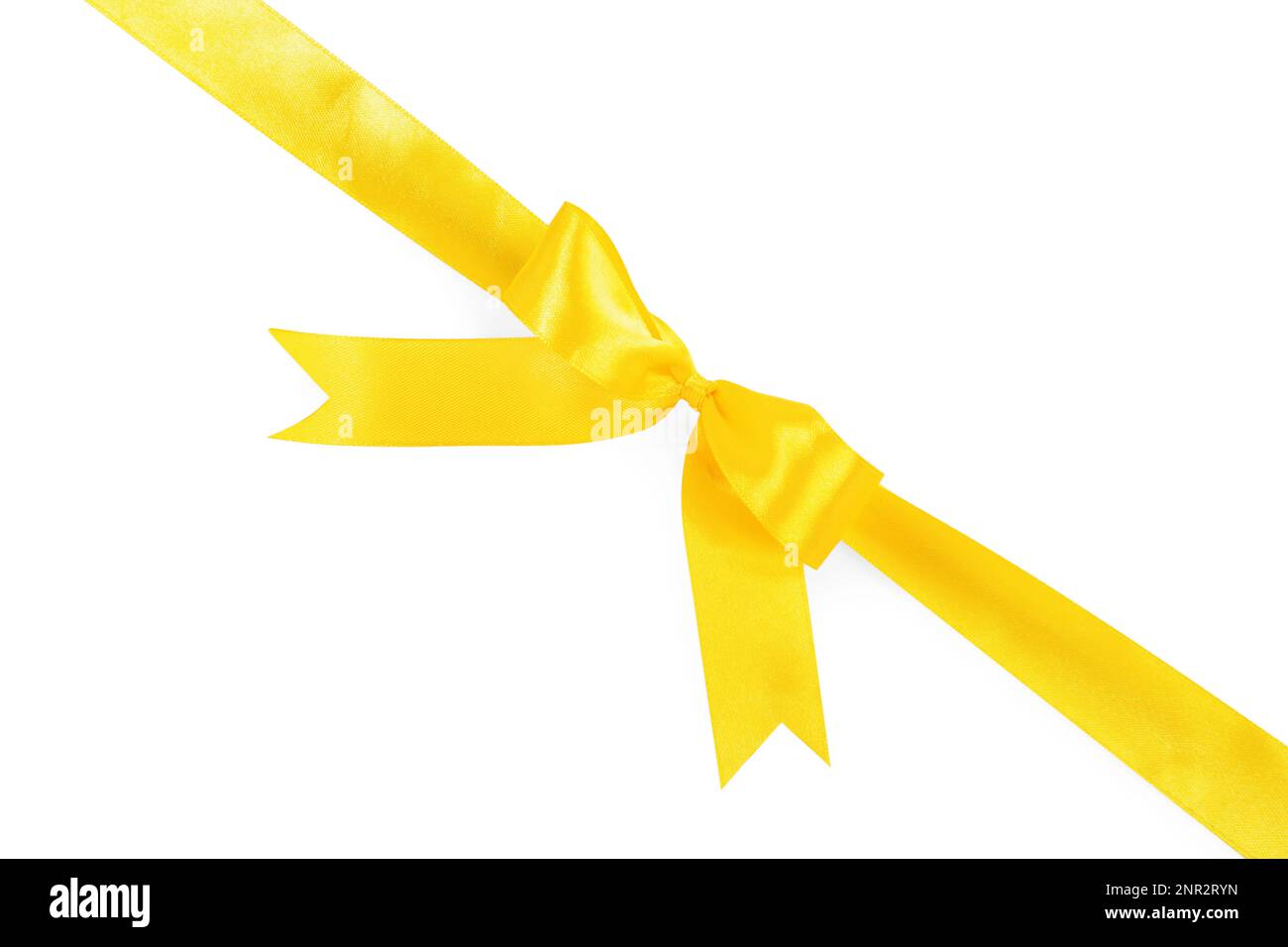 Yellow ribbon on white background, top view Stock Photo - Alamy