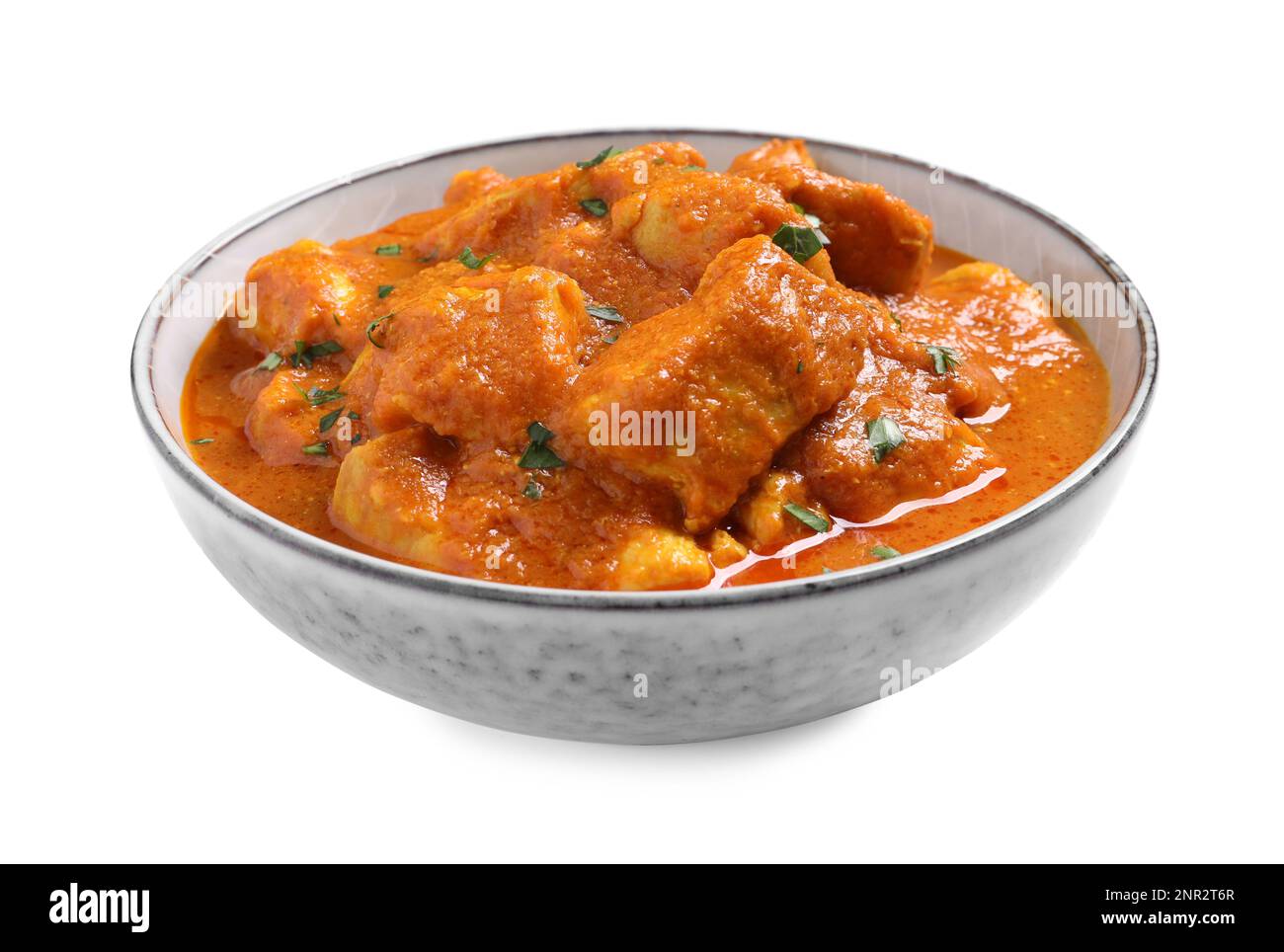 Bowl of delicious chicken curry on white background Stock Photo - Alamy