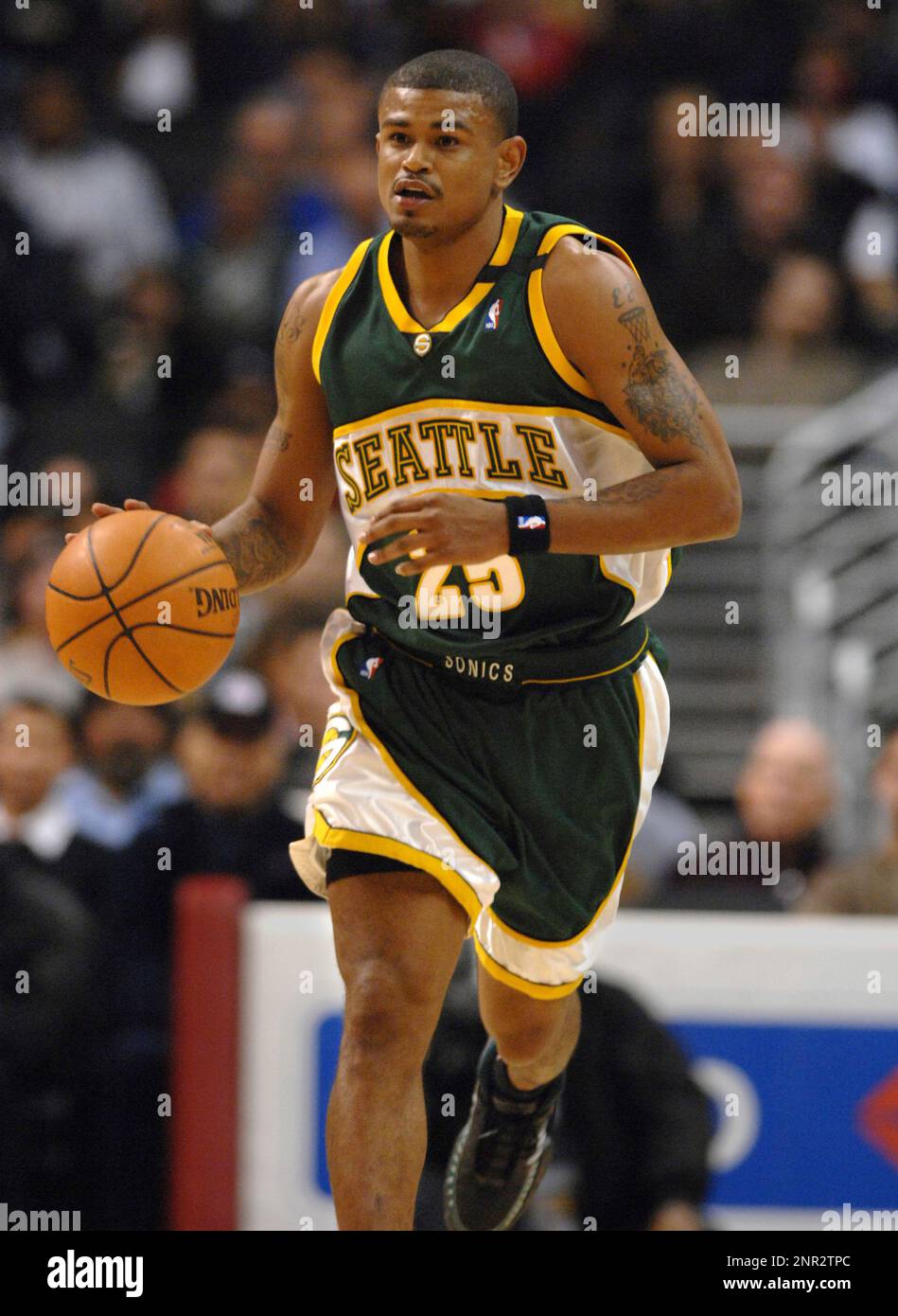 Earl Watson of the Seattle SuperSonics dribbles up court during 96-91 ...