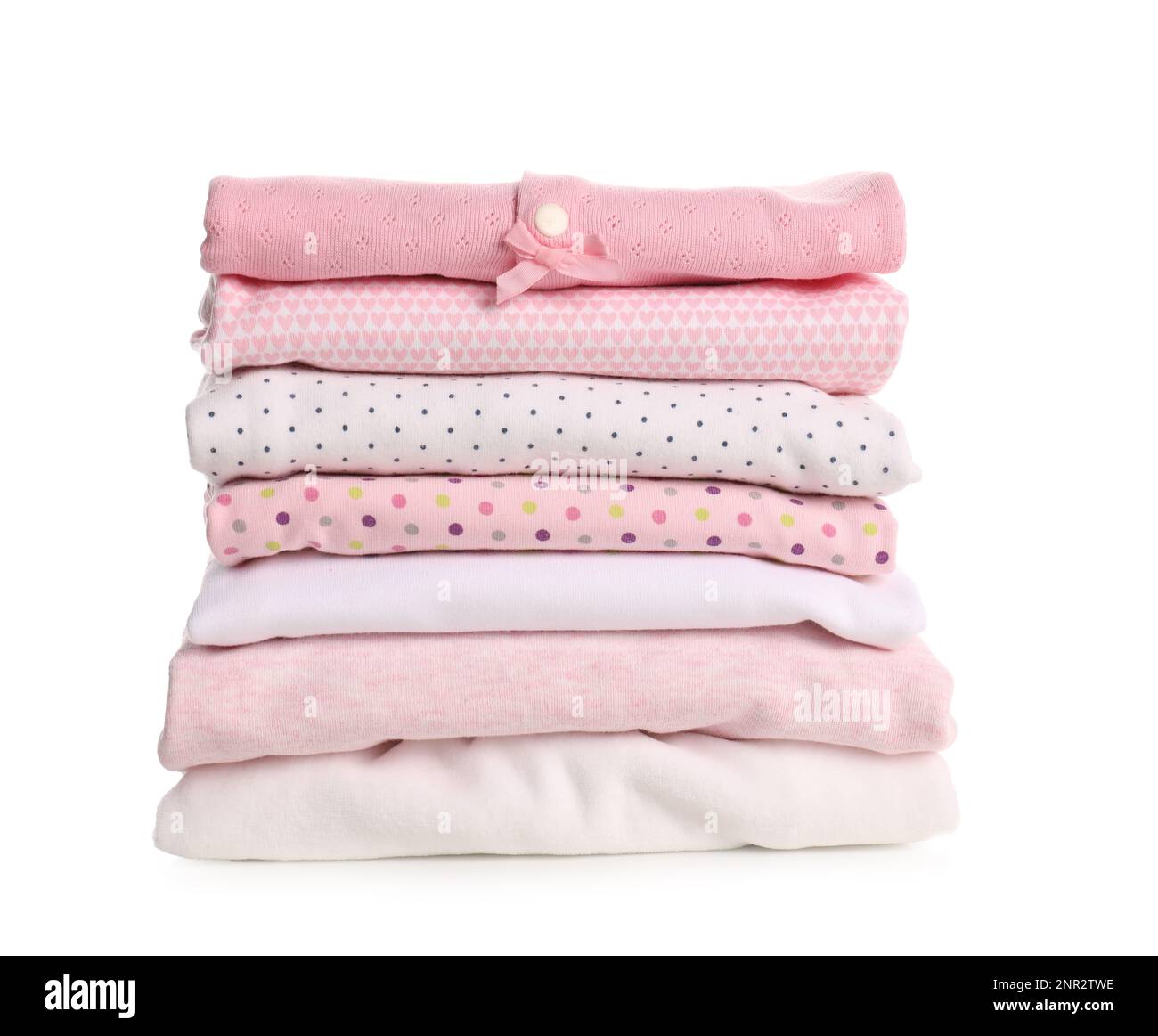 Stack of baby girl's clothes on white background Stock Photo - Alamy