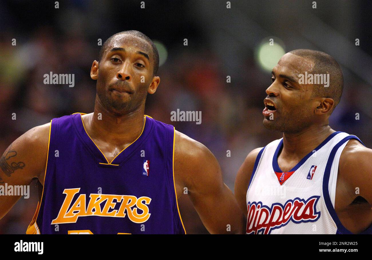 Kobe Bryant of the Los Angeles Lakers #24, left, and Cuttino Mobley of ...