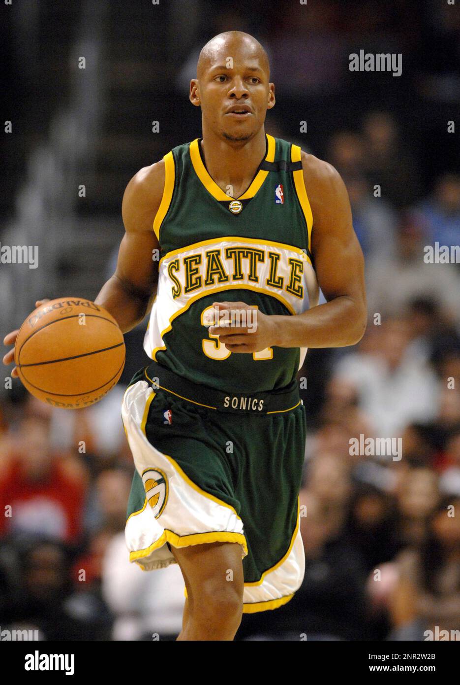 Ray Allen of the Seattle SuperSonics dribbles up court during 96-91 ...