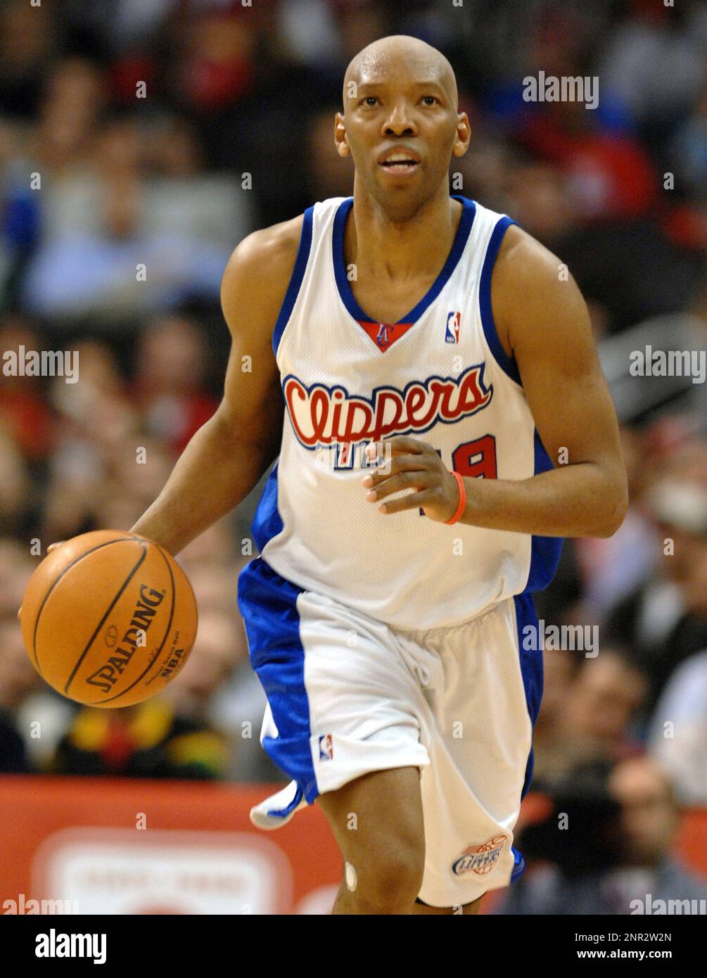Sam Cassell of the Los Angeles Clippers dribbles up court during 96-91 ...