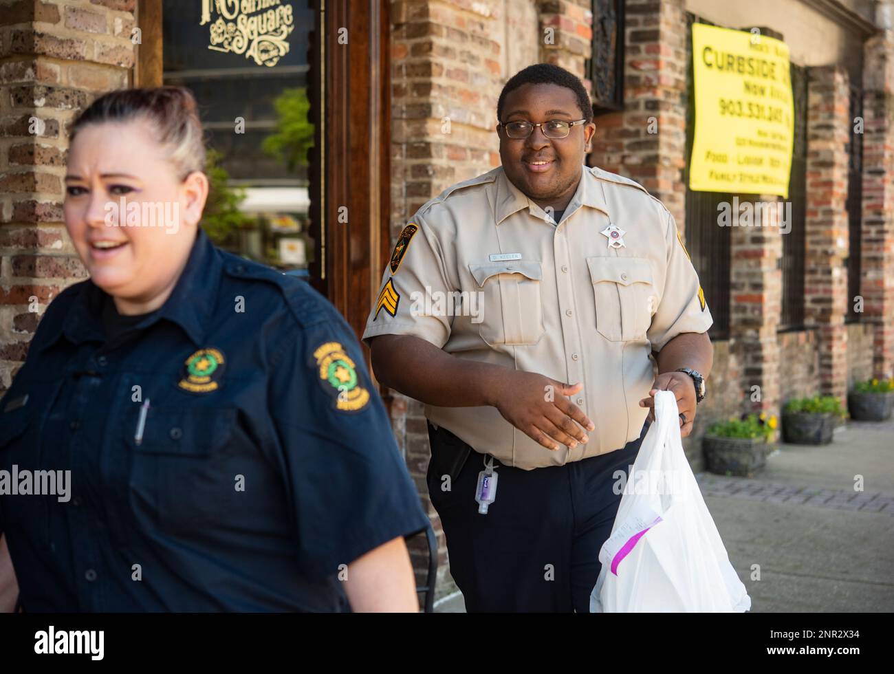 Smith County Sheriff's Office Detention Officer Dante Keeler, at right ...