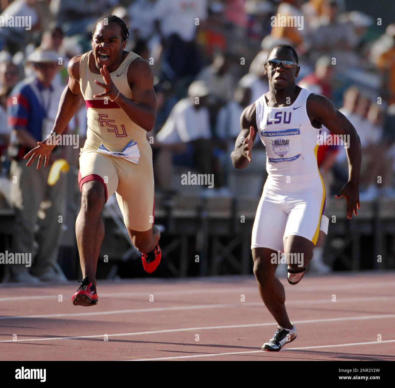 Walter Dix of Florida State, left, and Trindon Holliday of LSU sprint ...