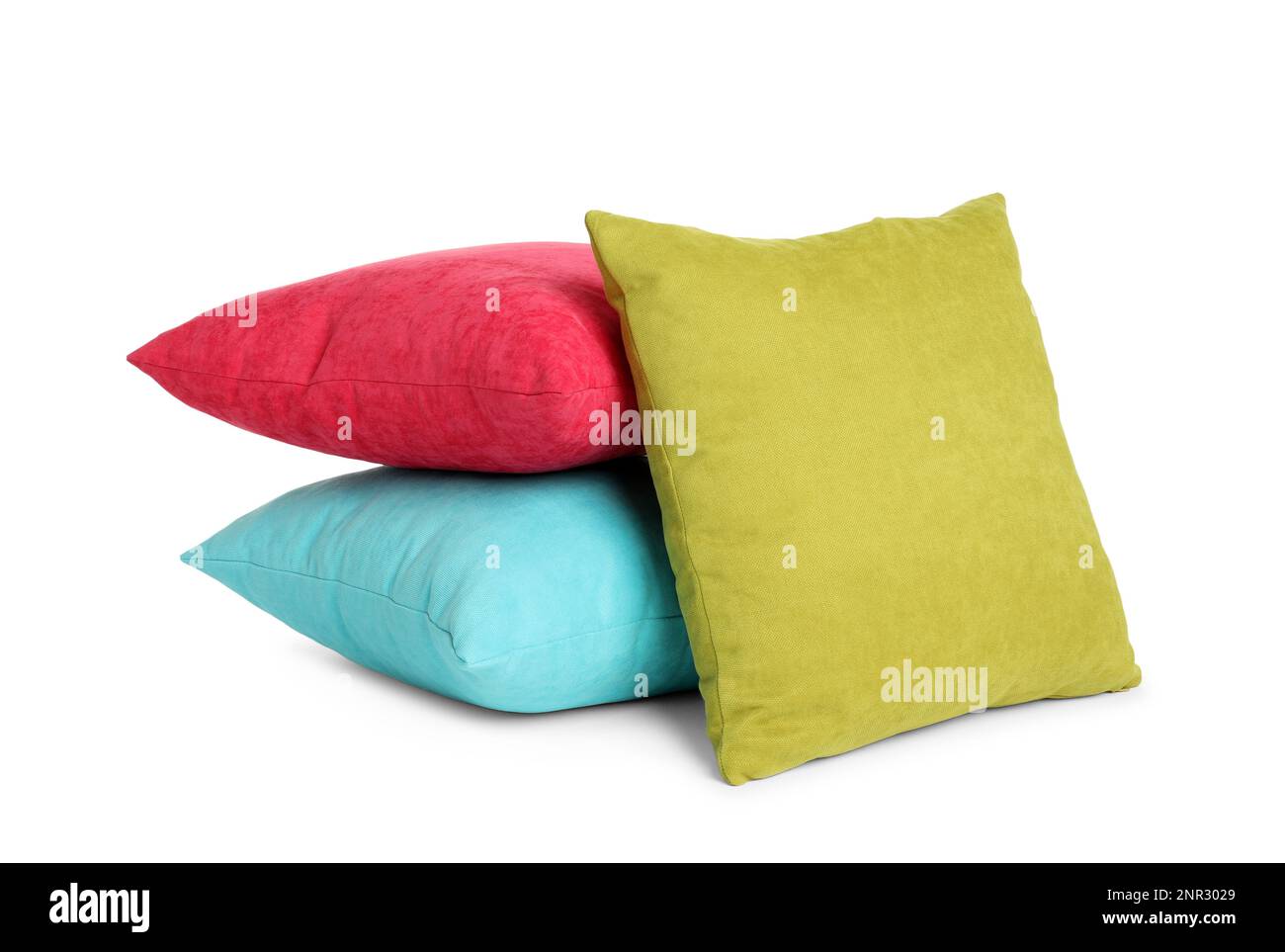 Different colorful decorative pillows on white background Stock Photo ...