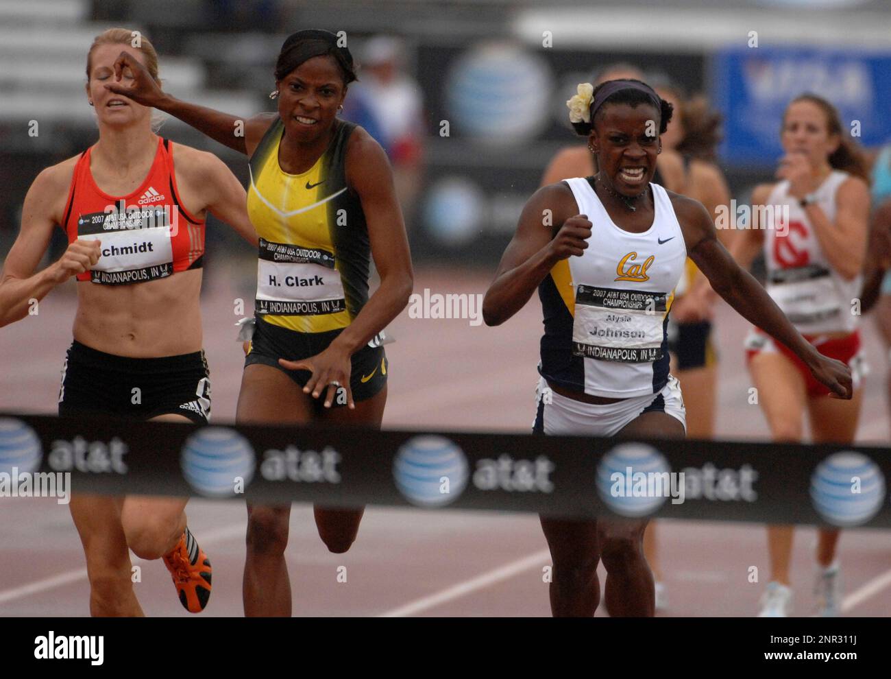 Alysia Johnson aka Alysia Montano, right, holds off Hazel Clark, center ...