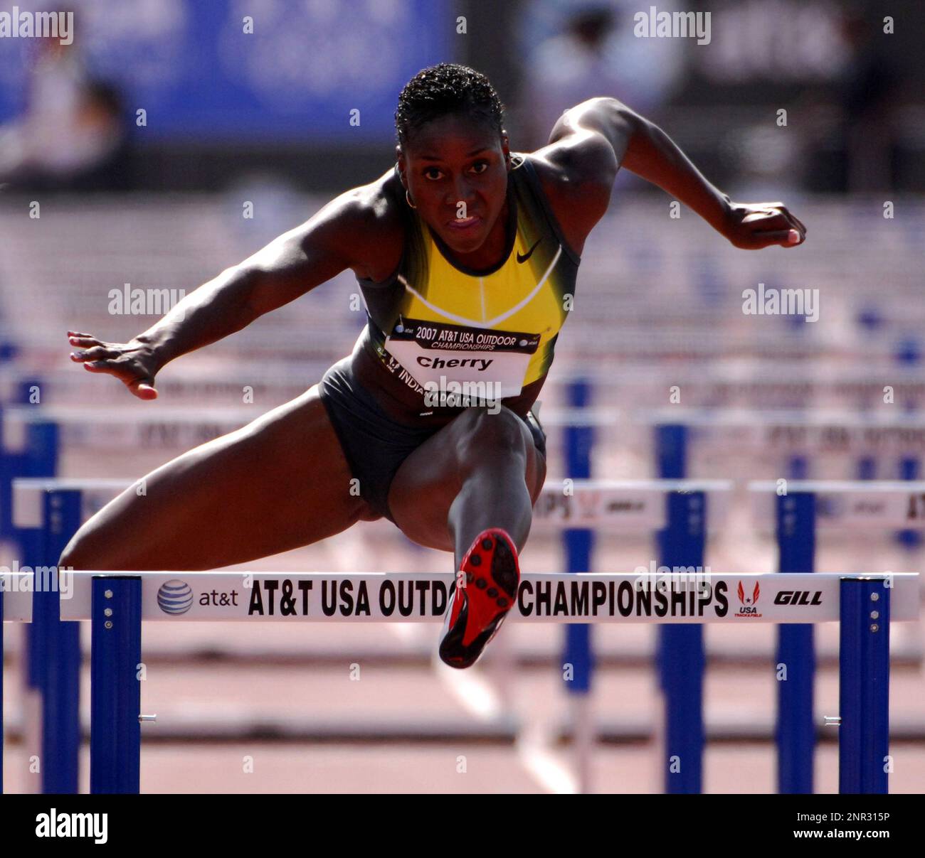 Damu Cherry finished second in women's 100-meter hurdle heat in 13.00 ...