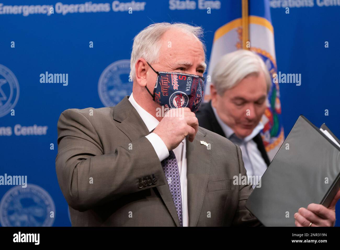 Minnesota Governor Tim Walz wears a mask in the press conference ...