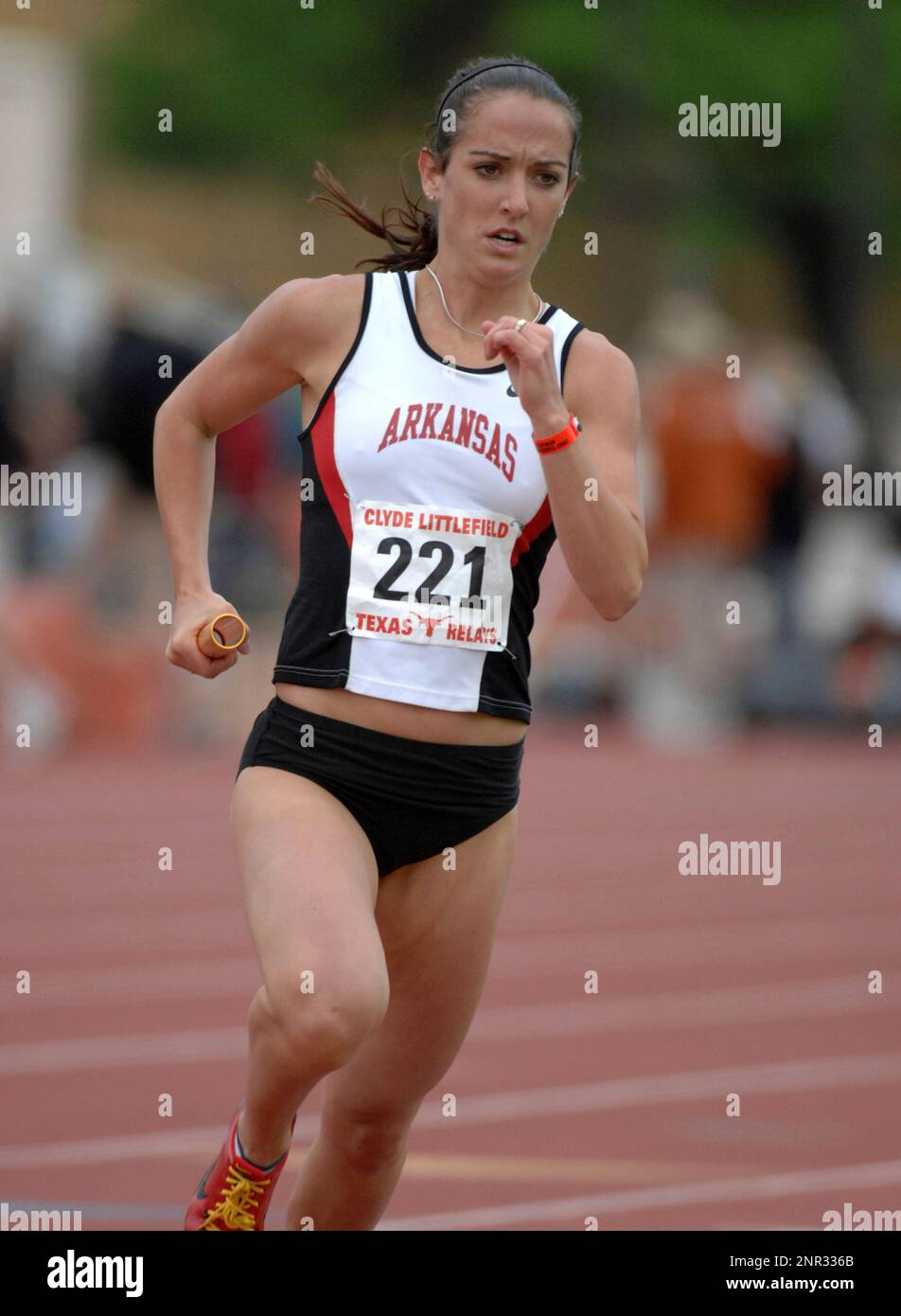 Paige Farrell runs a leg on Arkansas heat-winning women's 4 x 400-meter ...