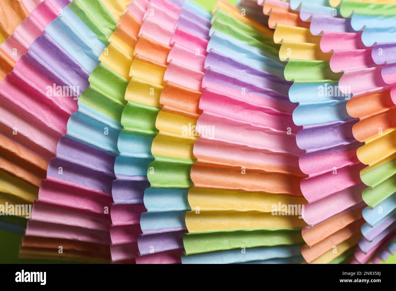 Colorful paper cupcake molds as background, closeup Stock Photo - Alamy