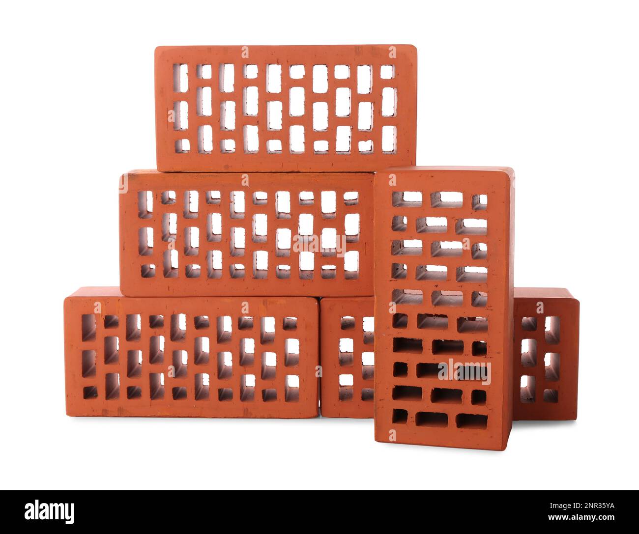 Many red bricks on white background. Building material Stock Photo - Alamy