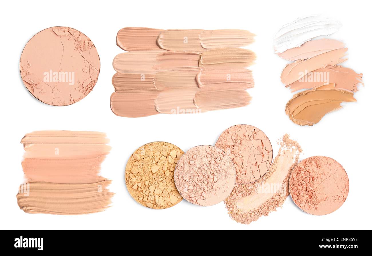 Set with different liquid foundation and face powder on white ...