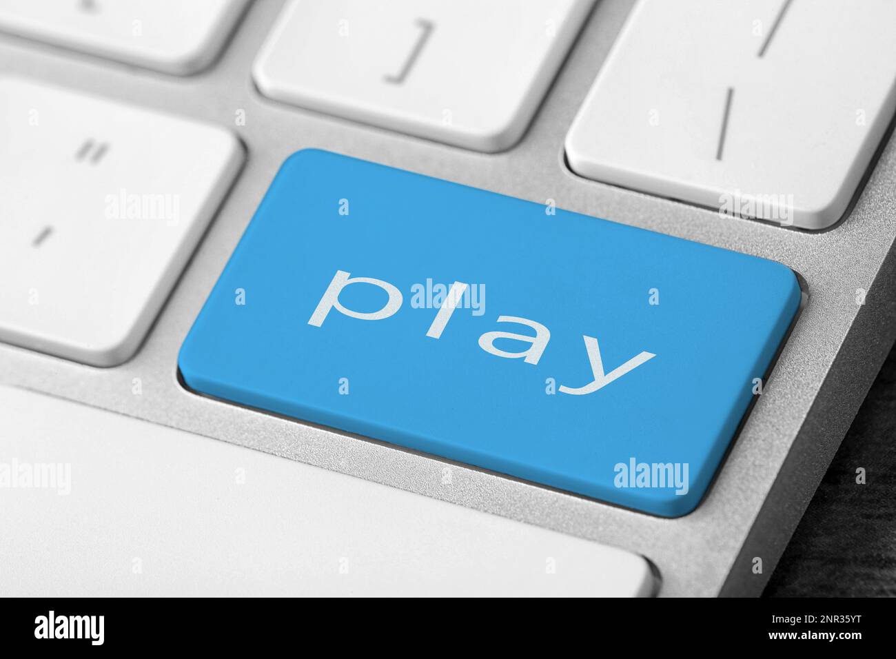 Light blue button with word PLAY on keyboard, closeup Stock Photo - Alamy