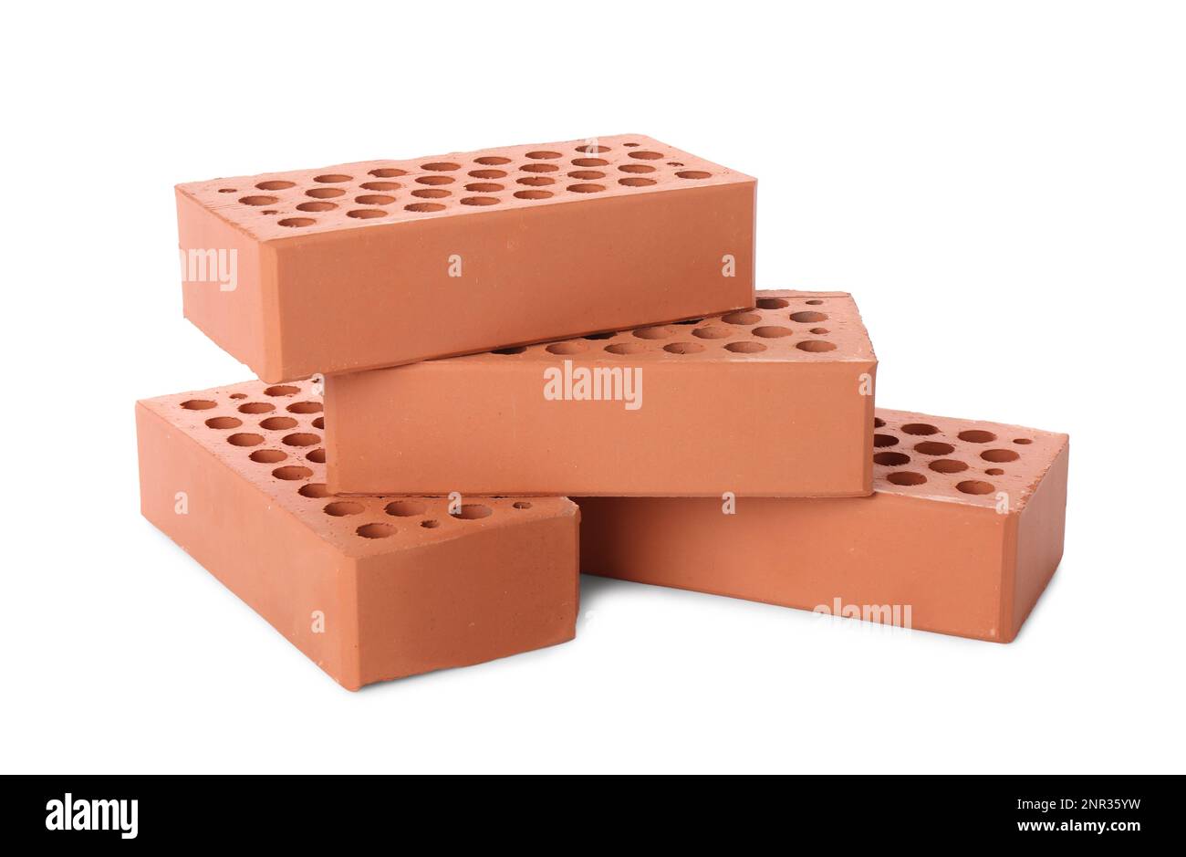 Many red bricks on white background. Building material Stock Photo - Alamy