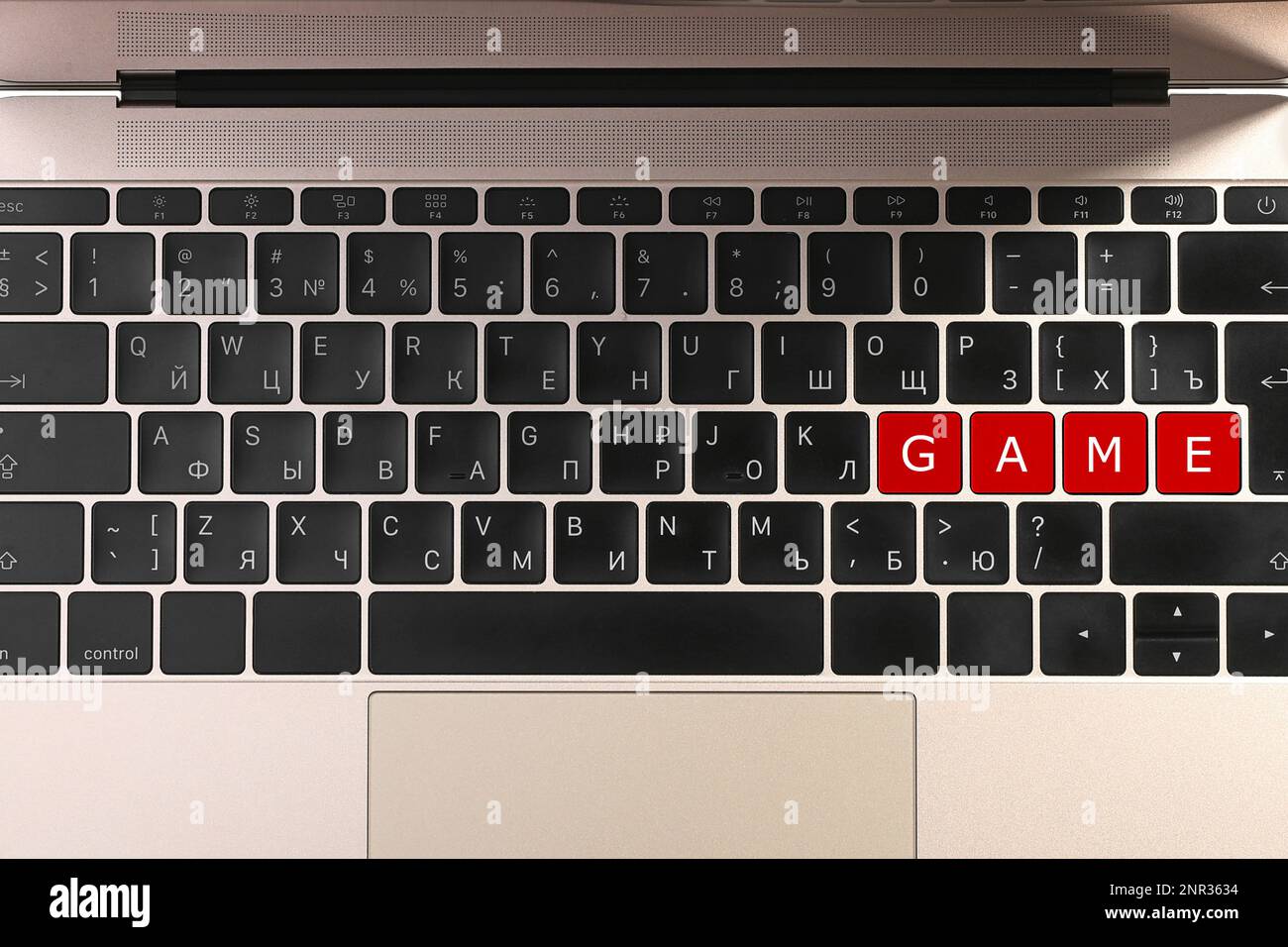 Red buttons with letters G A M E on laptop keyboard, top view Stock ...