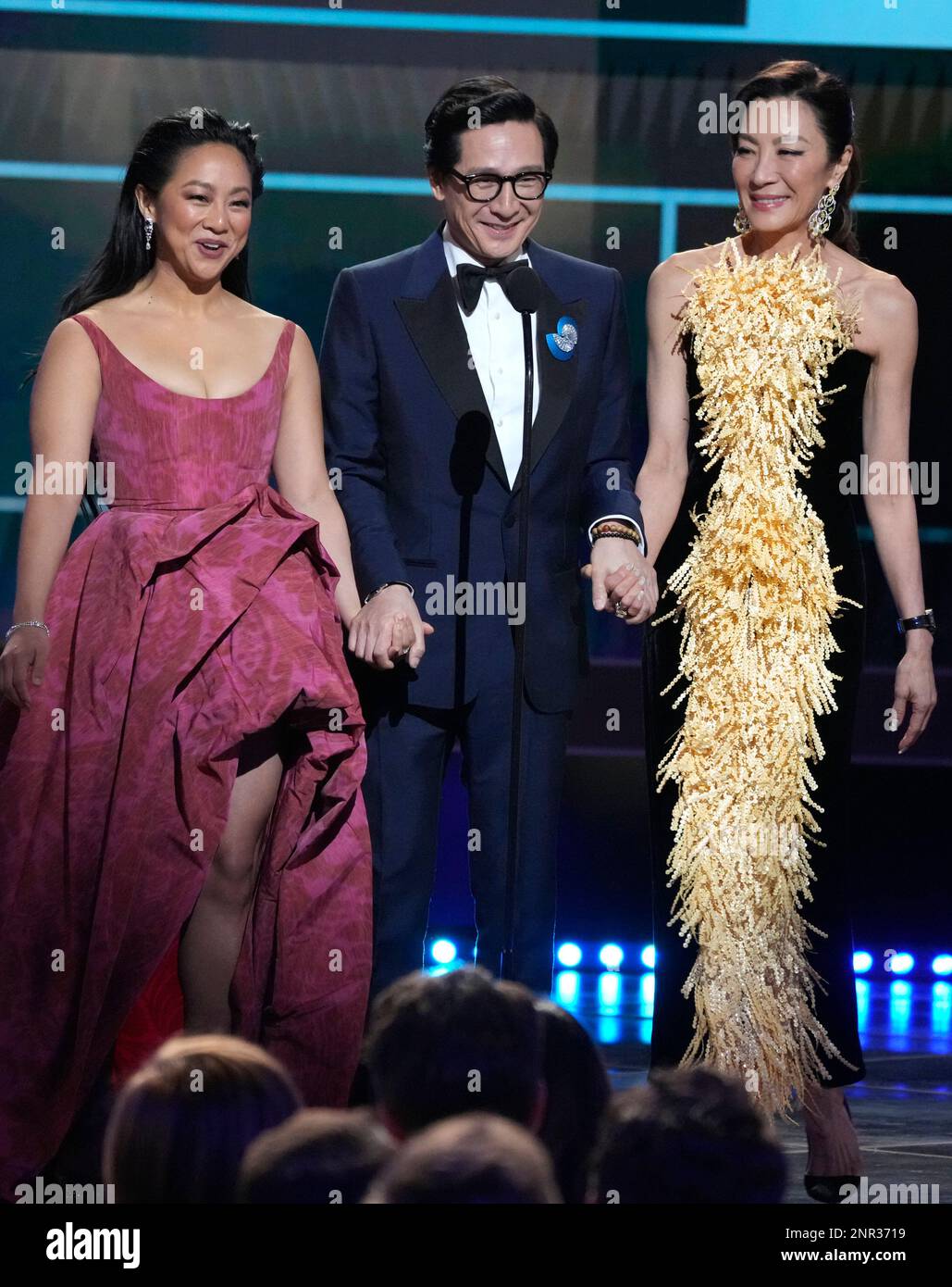 Stephanie Hsu, from left, Ke Huy Quan, and Michelle Yeo, members of the cast of "Everything ...
