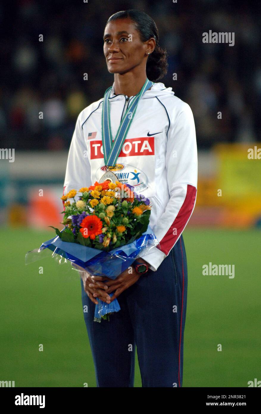 Bronze medalist Sandra Glover of the United States on the awards podium ...