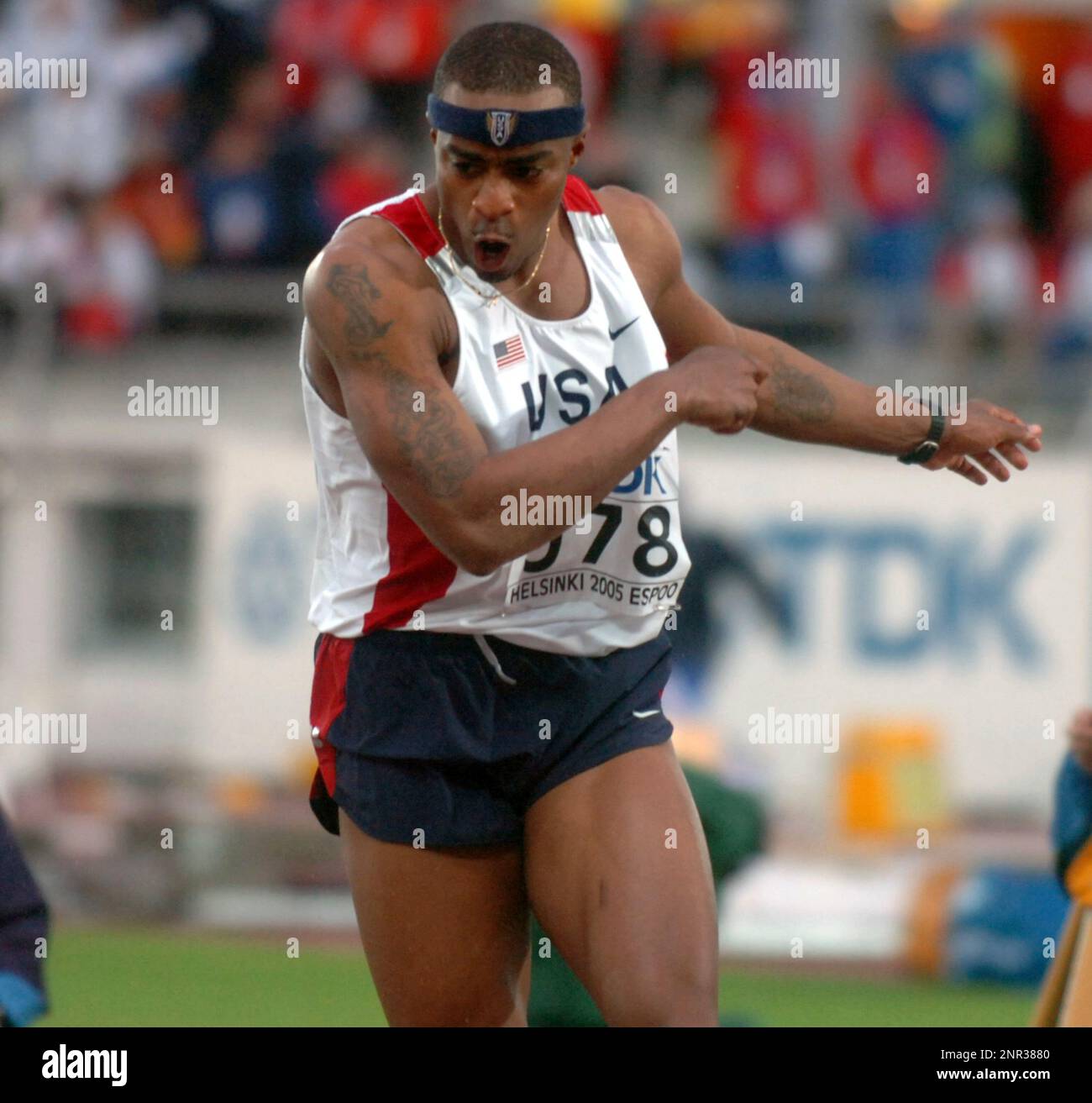 Walter Davis of the United States wins the triple jump at 57-7 3/4 (17 ...