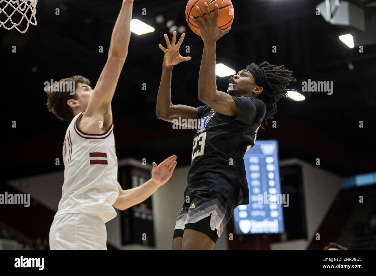 Stanford forward Neal Begovich, left, defends against Washington guard ...