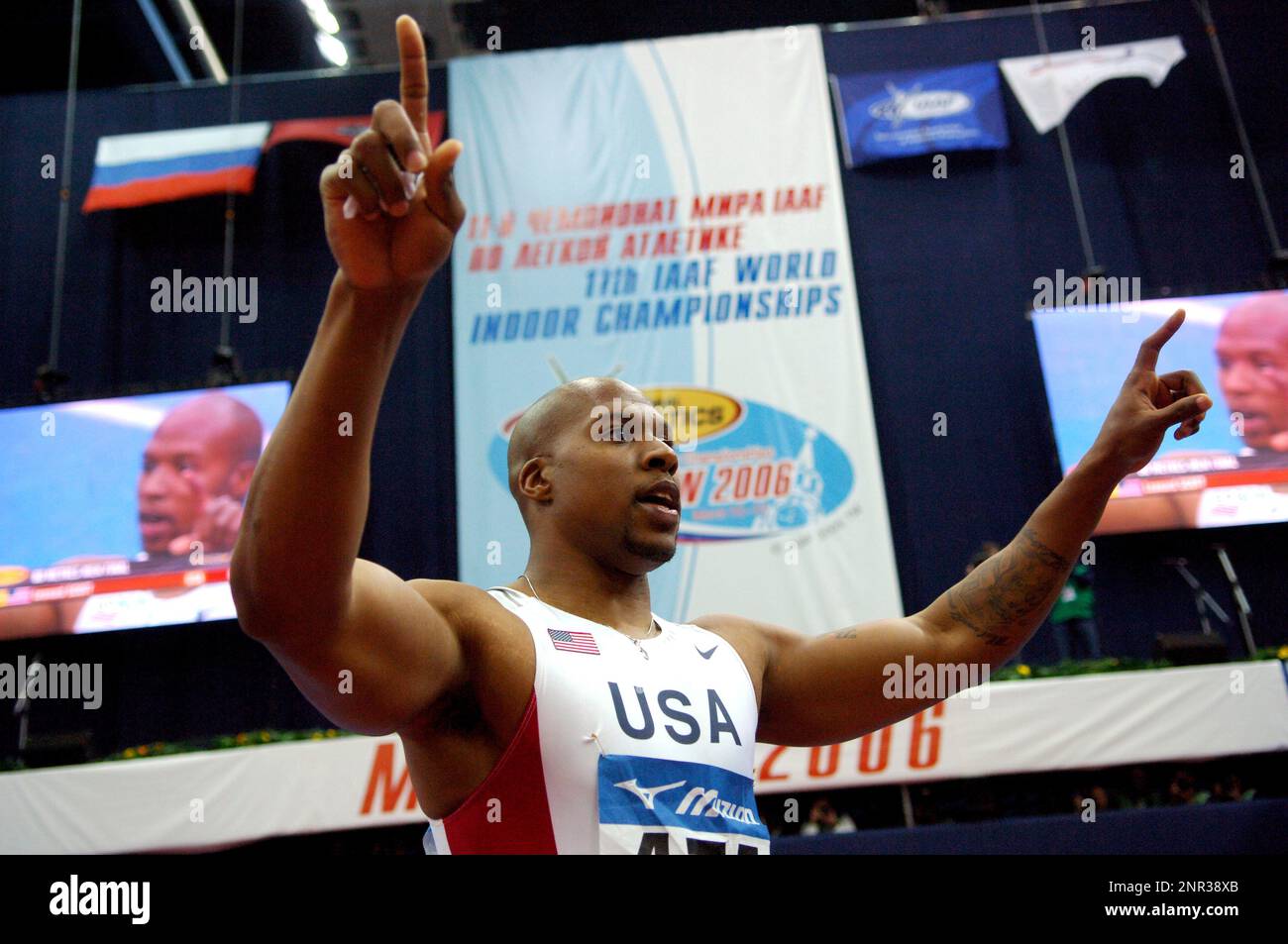 Leonard Scott of the Untied States celebrates after winning the 60 ...