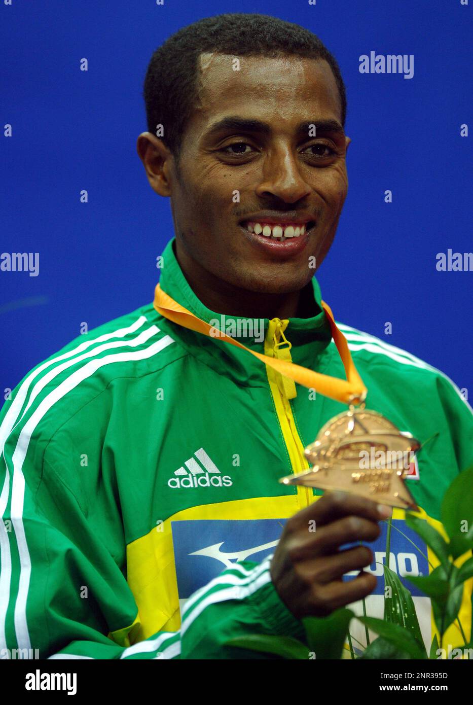 Kenenisa Bekele of Ethiopia poses with gold medal after winning the ...