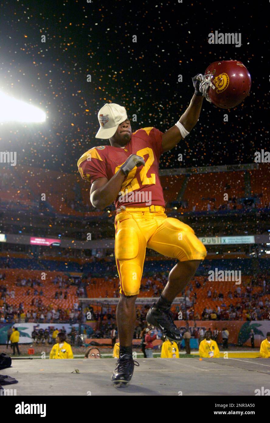 USC tailback Desmond Reed dances in celebration after 55-19 victory ...