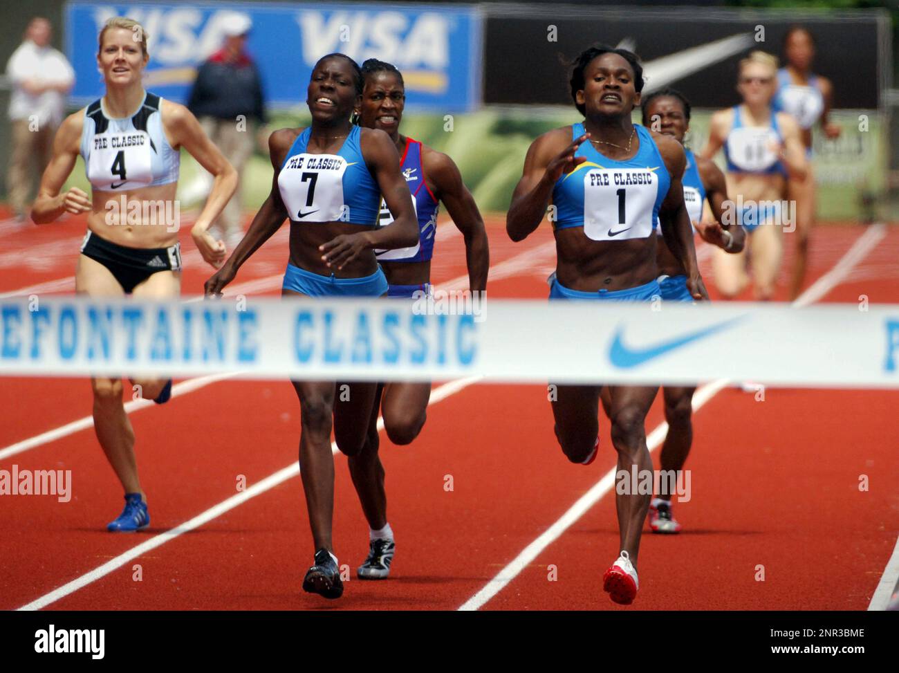 Maria Mutola (1) holds off Kenia Sinclair (7) to win the women's 800 ...