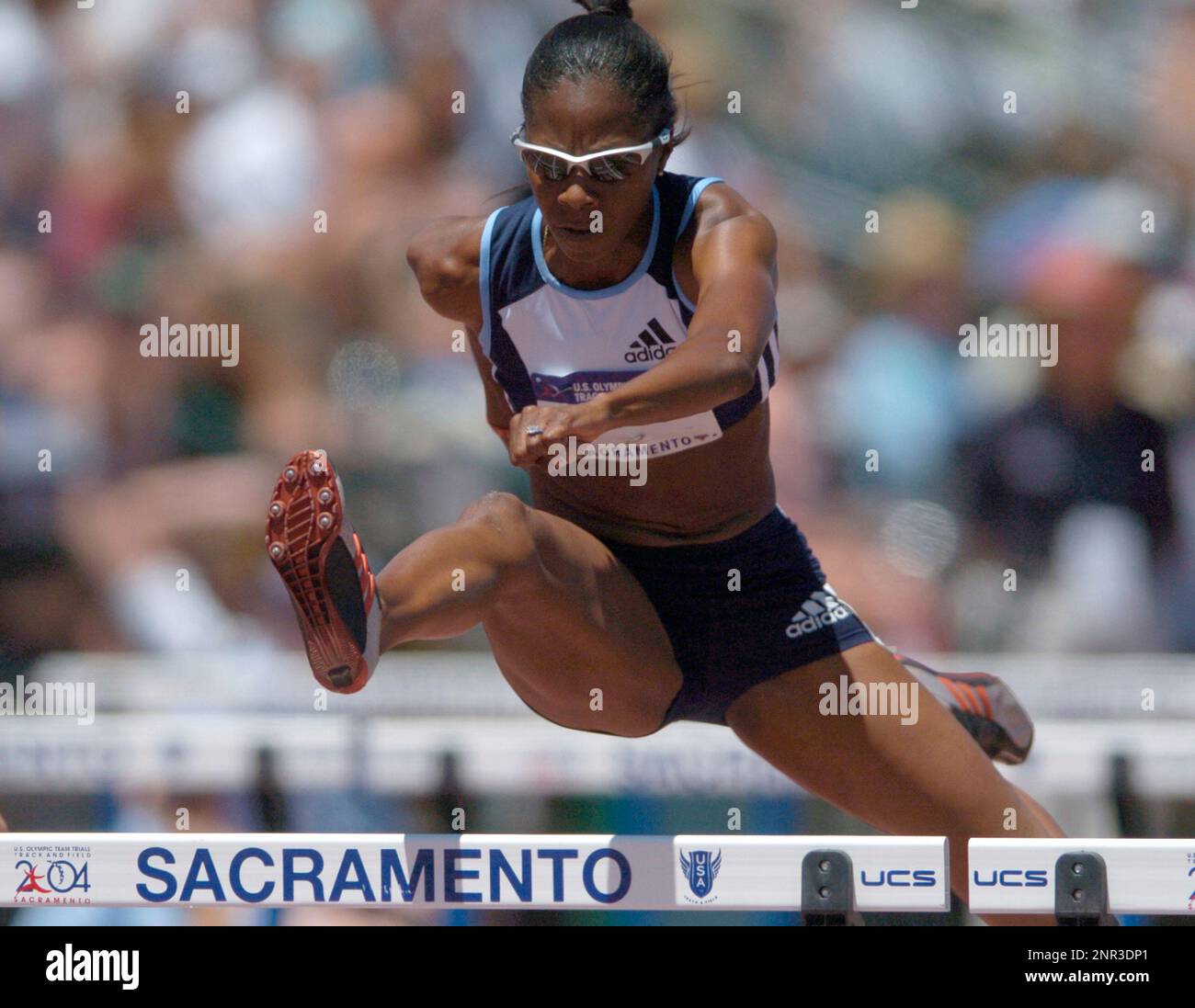 Melissa Morrison competes in the women's 100m hurdles in the U.S ...