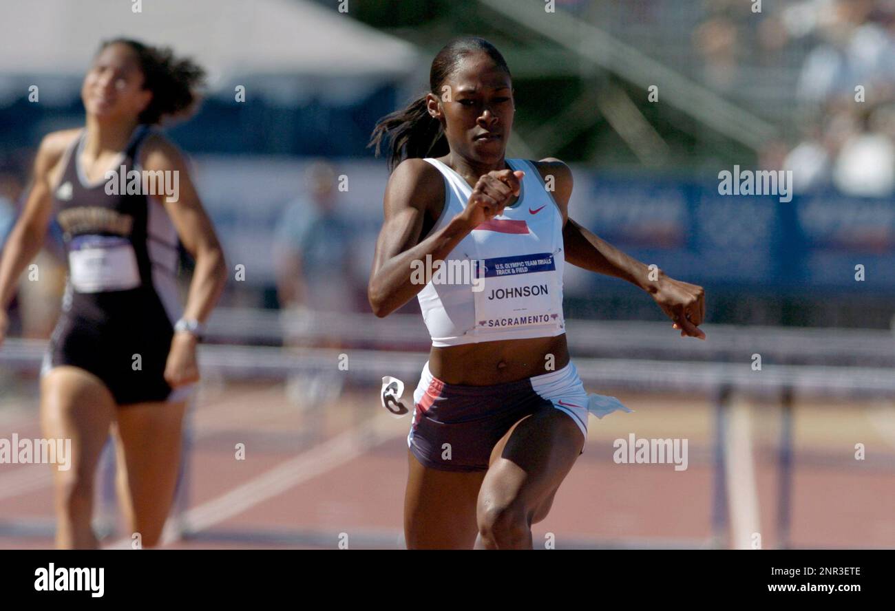 Sheena Johnson aka Sheena Tosta wins the women's 400-meter hurdles in ...