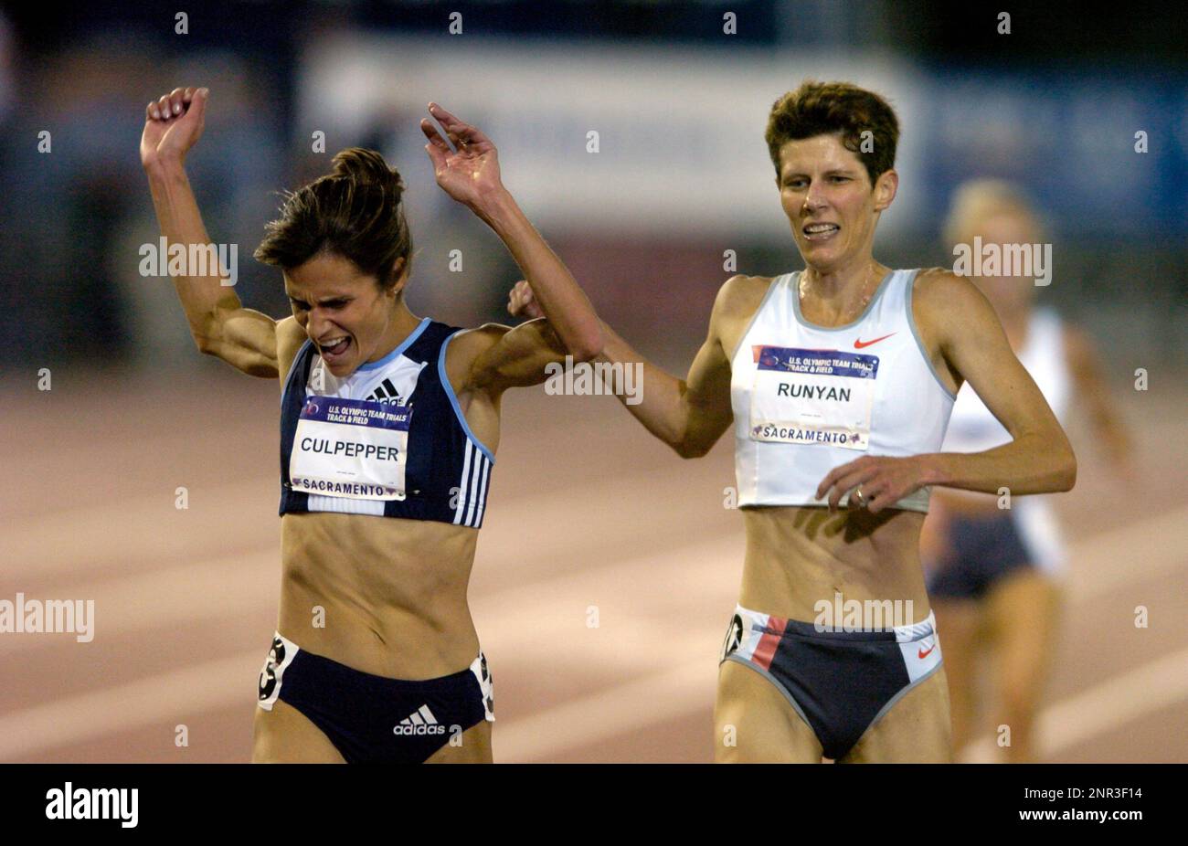 Shayne Culpepper (left) defeats Marla Runyan to win the women's 5,000 ...
