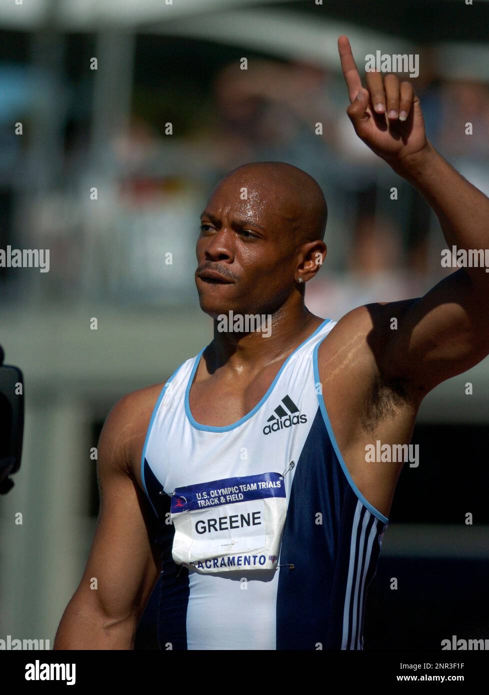 Maurice Greene celebrates after winning the 100 meters in a meet record ...