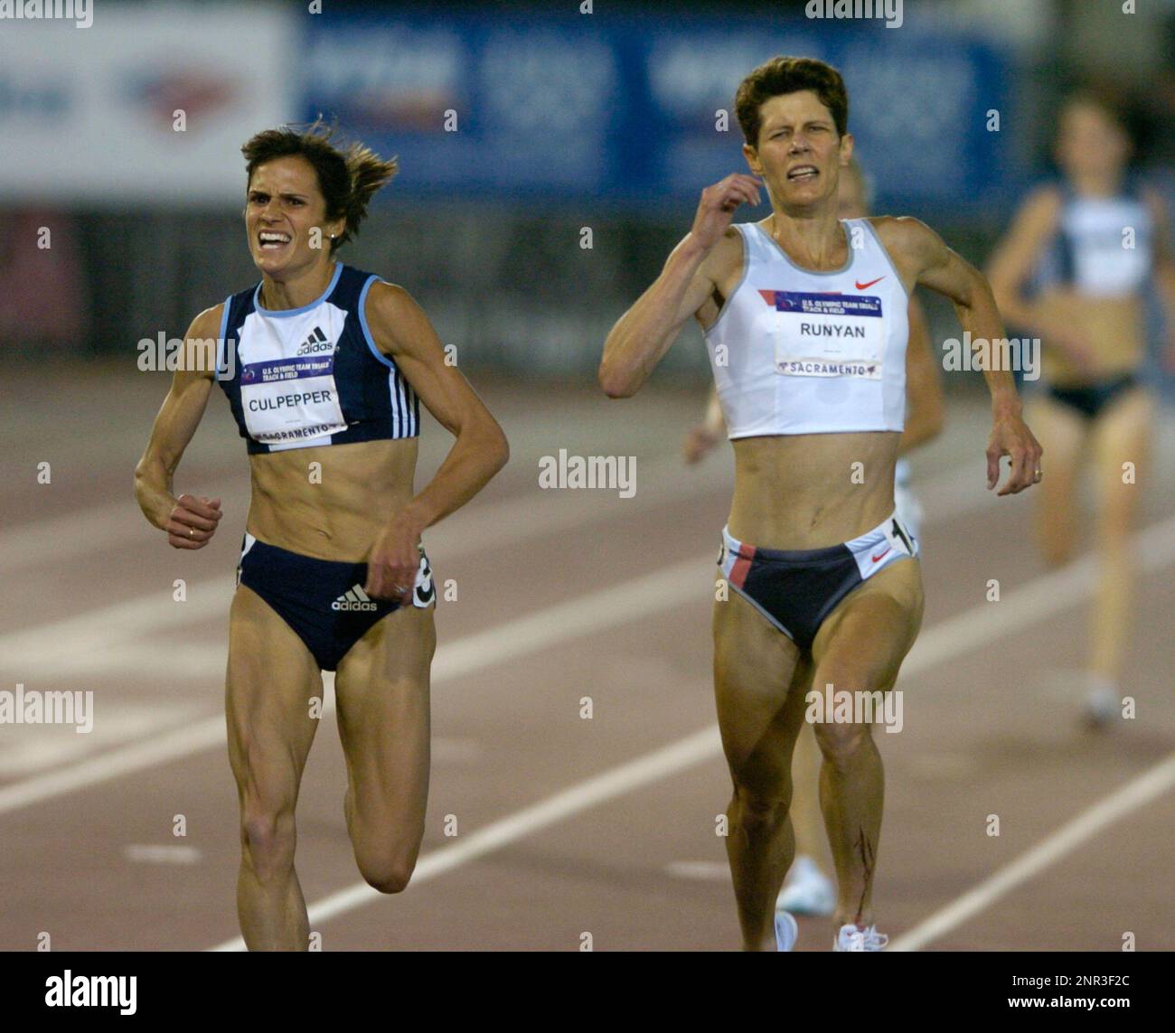 Shayne Culpepper (left) defeats Marla Runyan to win the women's 5,000 ...