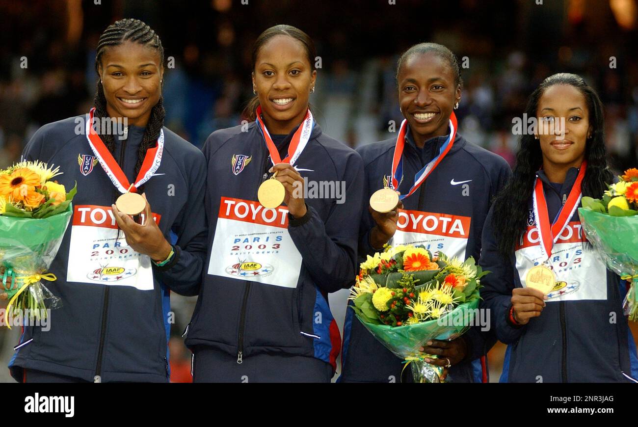 United States gold-medal winning 1,600-meter relay (from left ...