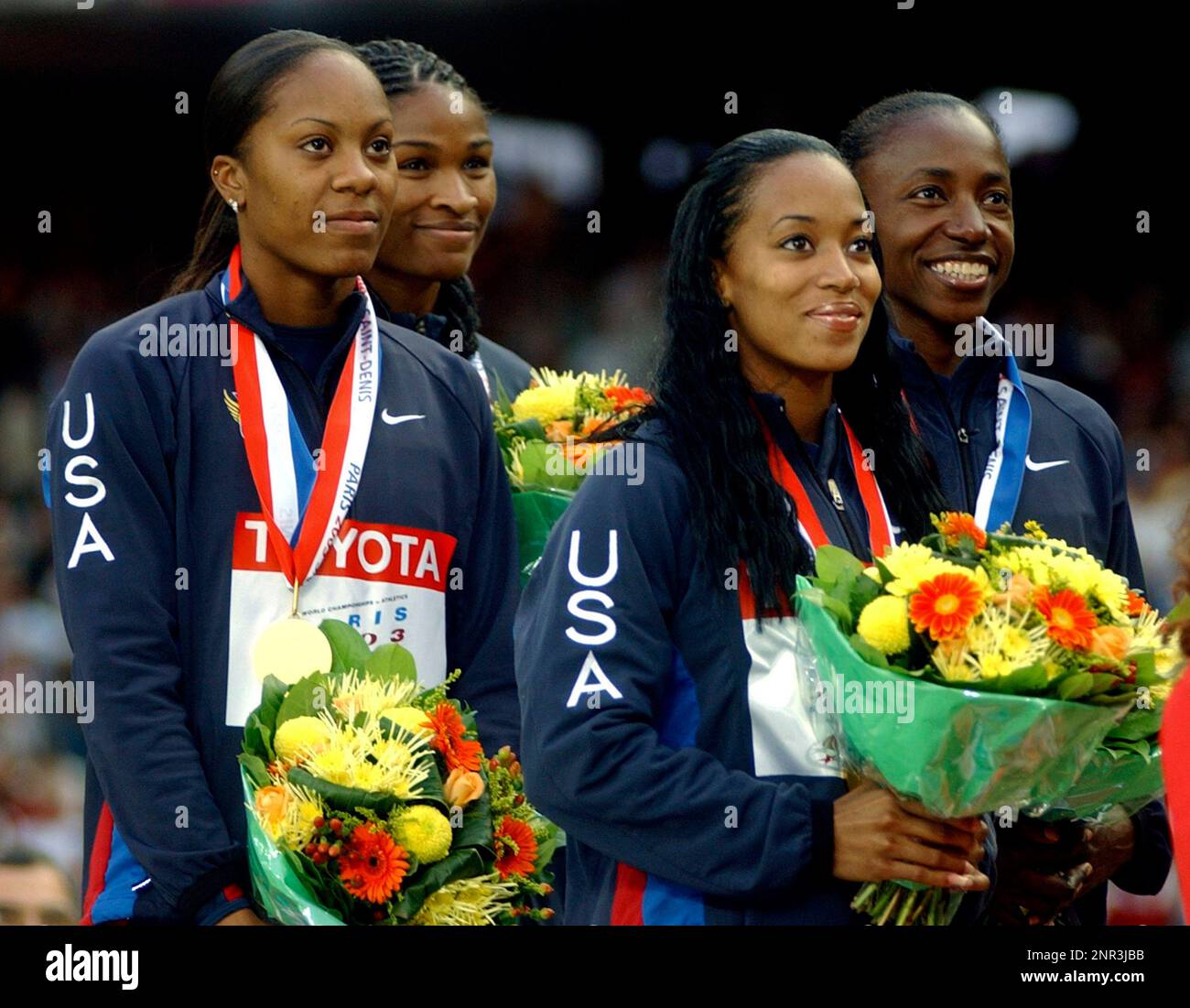 United States gold-medal winning 1,600-meter relay (from left): Sanya ...