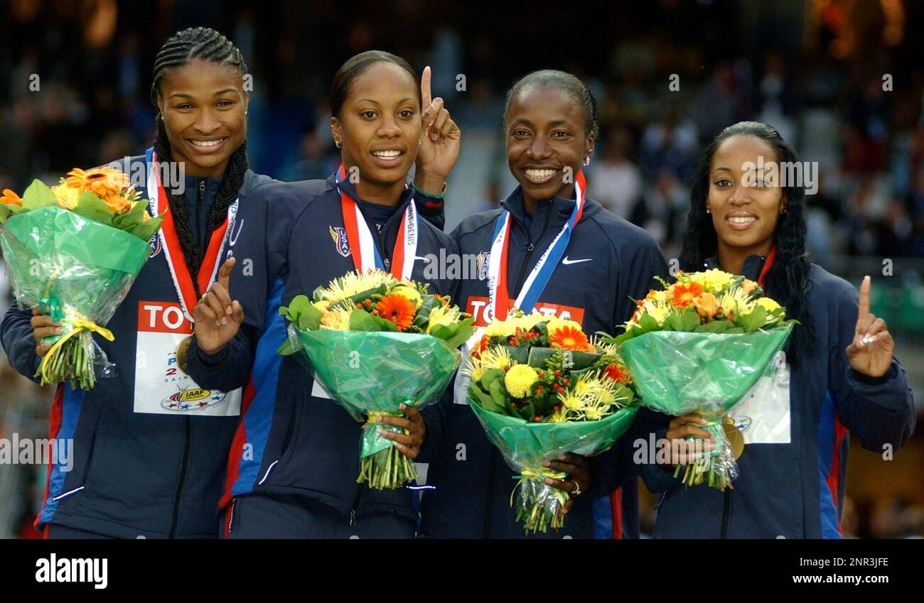 United States gold-medal winning 1,600-meter relay (from left ...