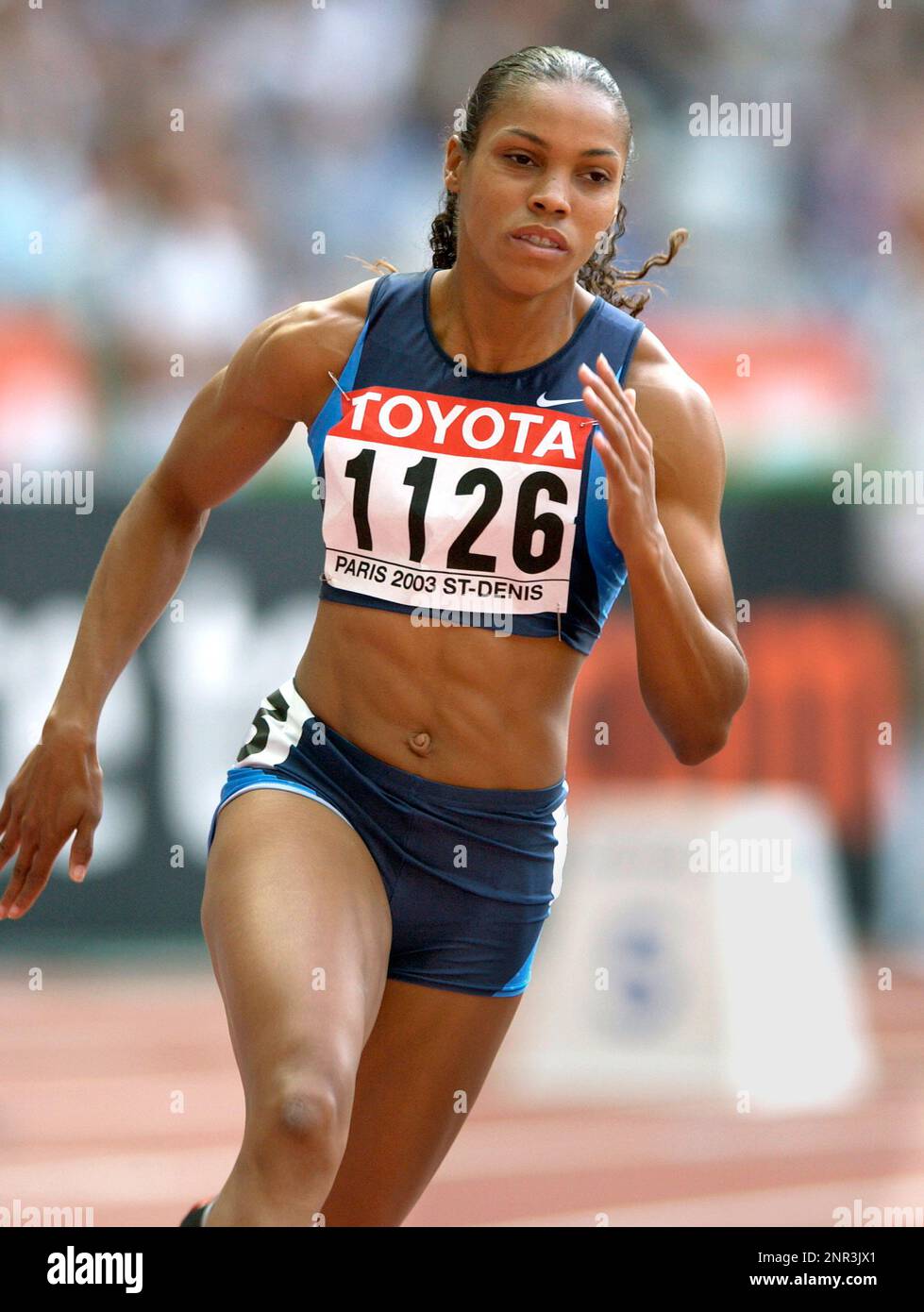 Torri Edwards of the United States finished second in first-round heat ...
