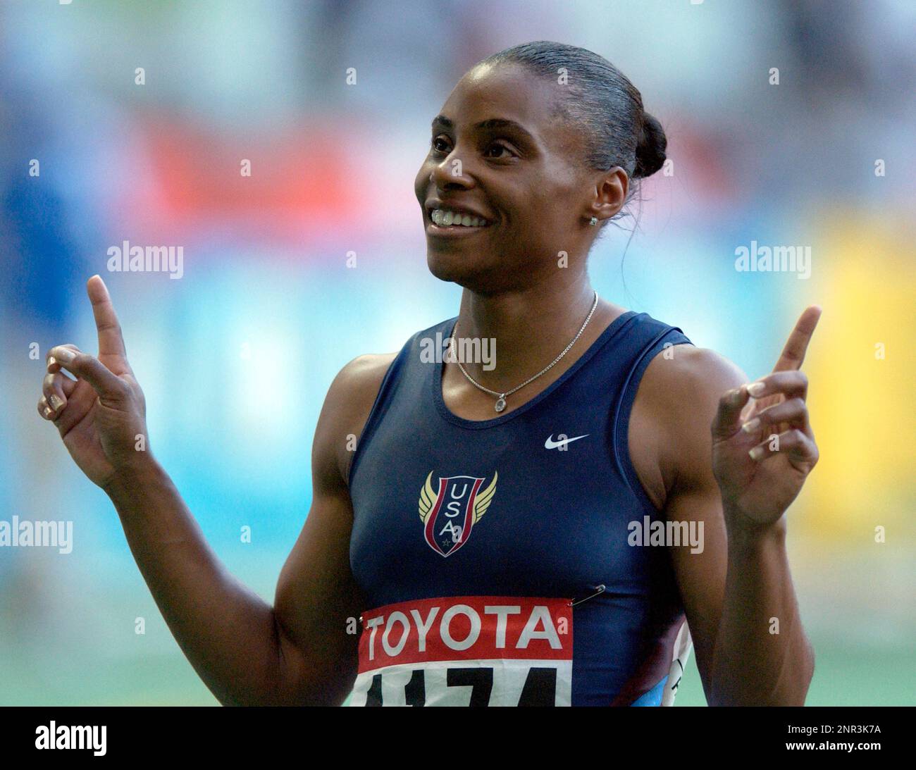 Kelli White of the United States celebrates after winning the 100 ...