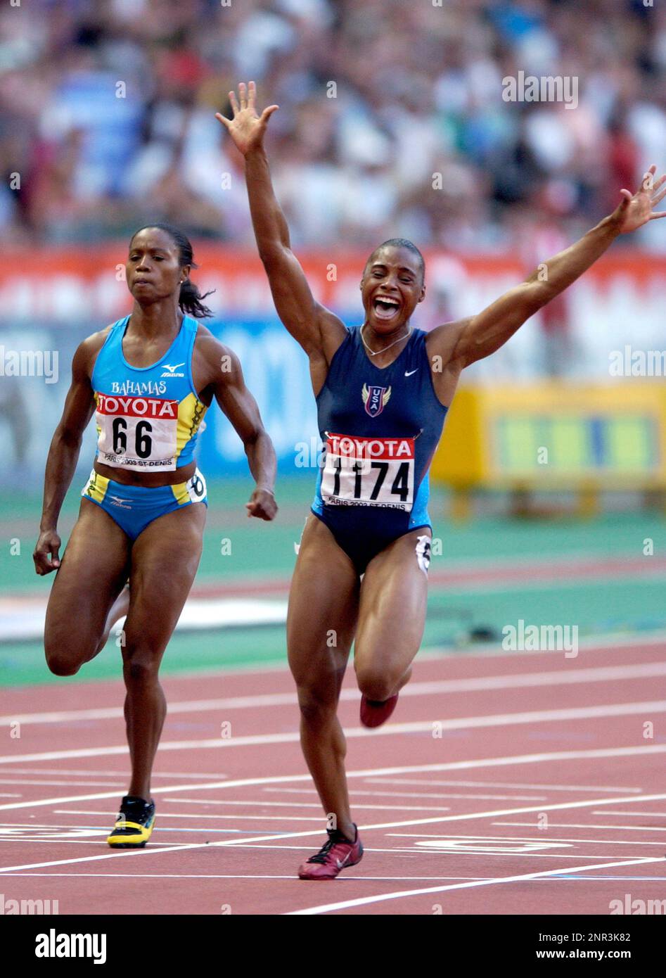 Kelli White of the United States celebrates after winning the 100 ...