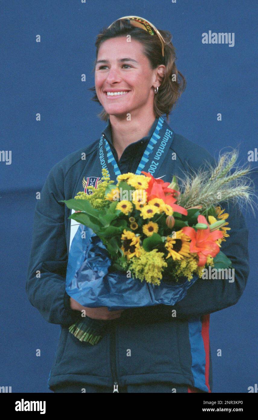 Stacy Dragila (USA) poses with the gold medal after winning the women's ...