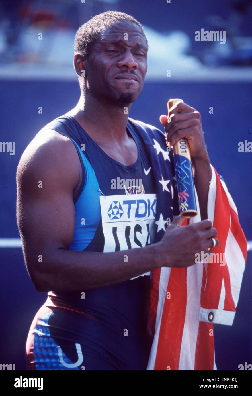 Dennis Mitchell reacts after the United States was disqualified in the ...