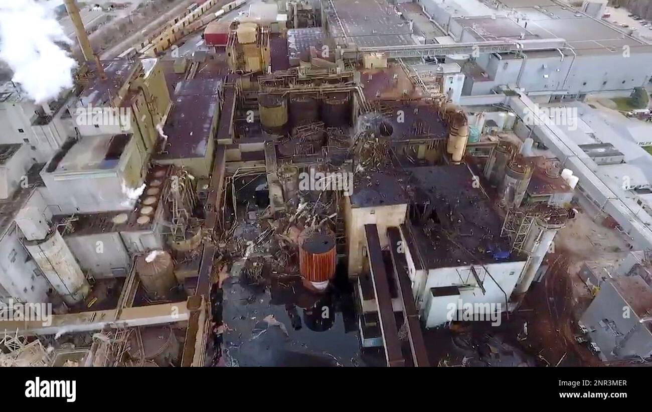 In this aerial view, bent and charred metal remains after an explosion ...