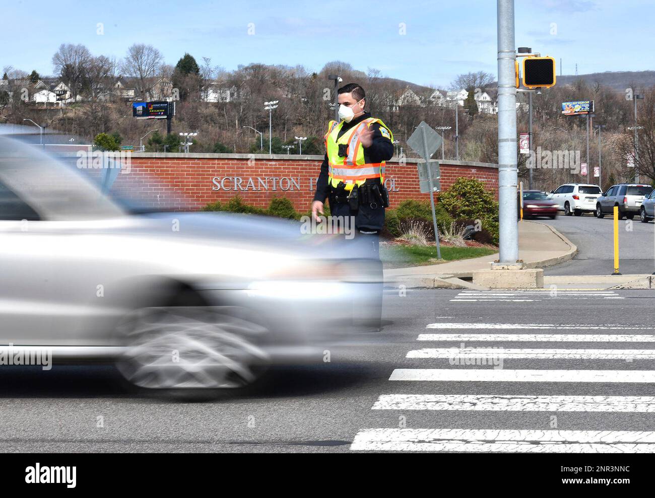 Scranton police officer John Cantafio directs traffic outside of ...