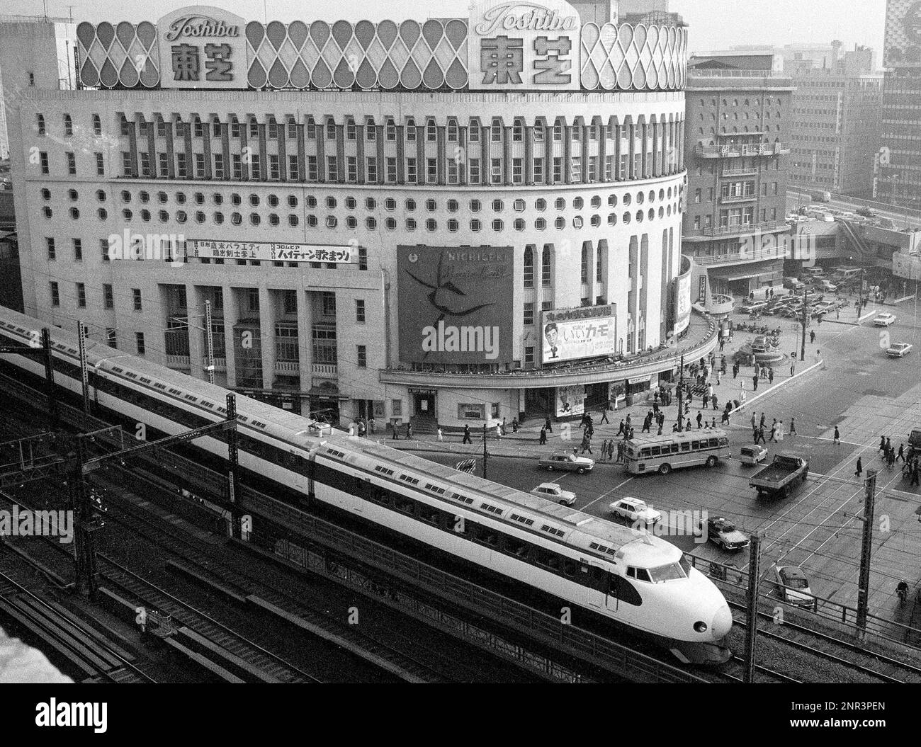 FILE - In this Dec. 21, 1964, file photo, Japan's Shinkansen, a high speed train, passes by ...