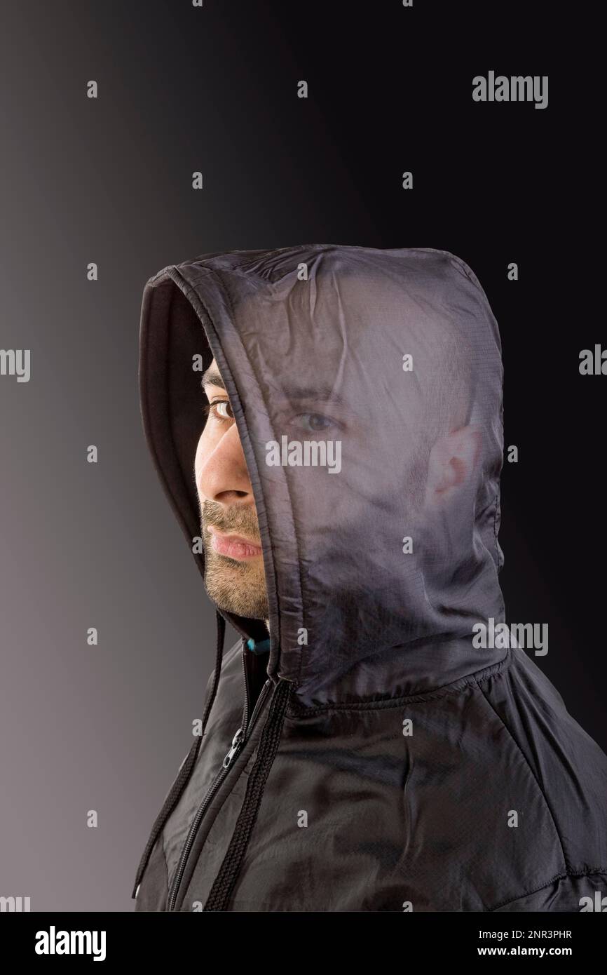 Mysterious hooded man Stock Photo - Alamy