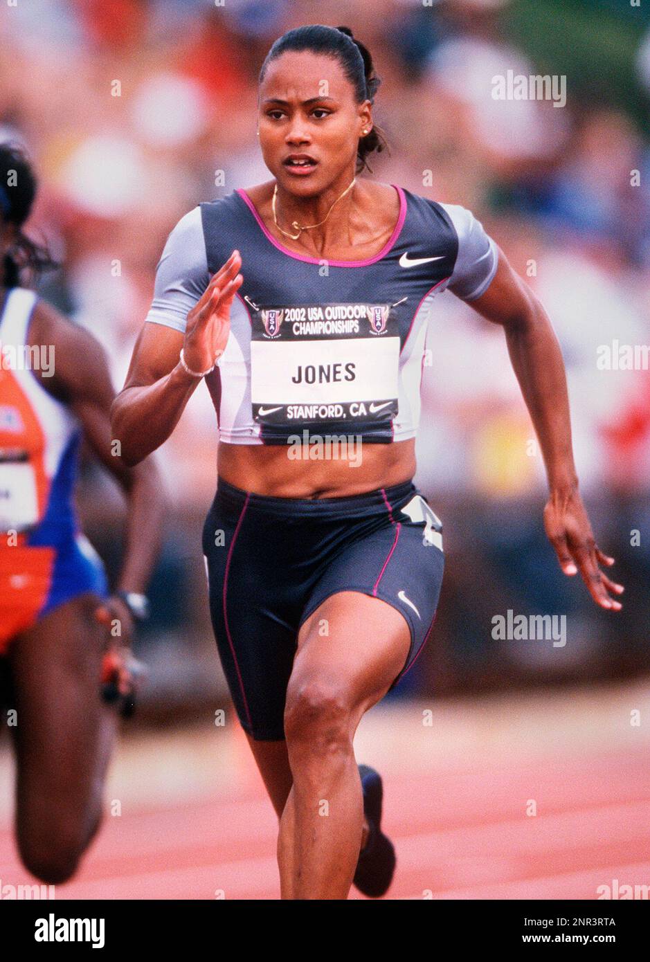Jun 22, 2002; Stanford, CA, USA; Marion Jones wins the womens 100m in ...