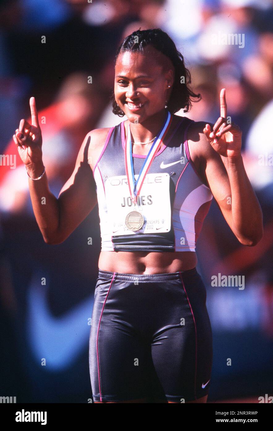 Jun 23, 2002; Stanford, CA, USA; Marion Jones poses after winning the ...